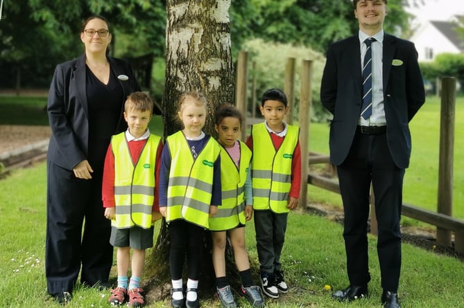 IN PICTURES: Opticians donates 500 hi-vis vests to local schools ...