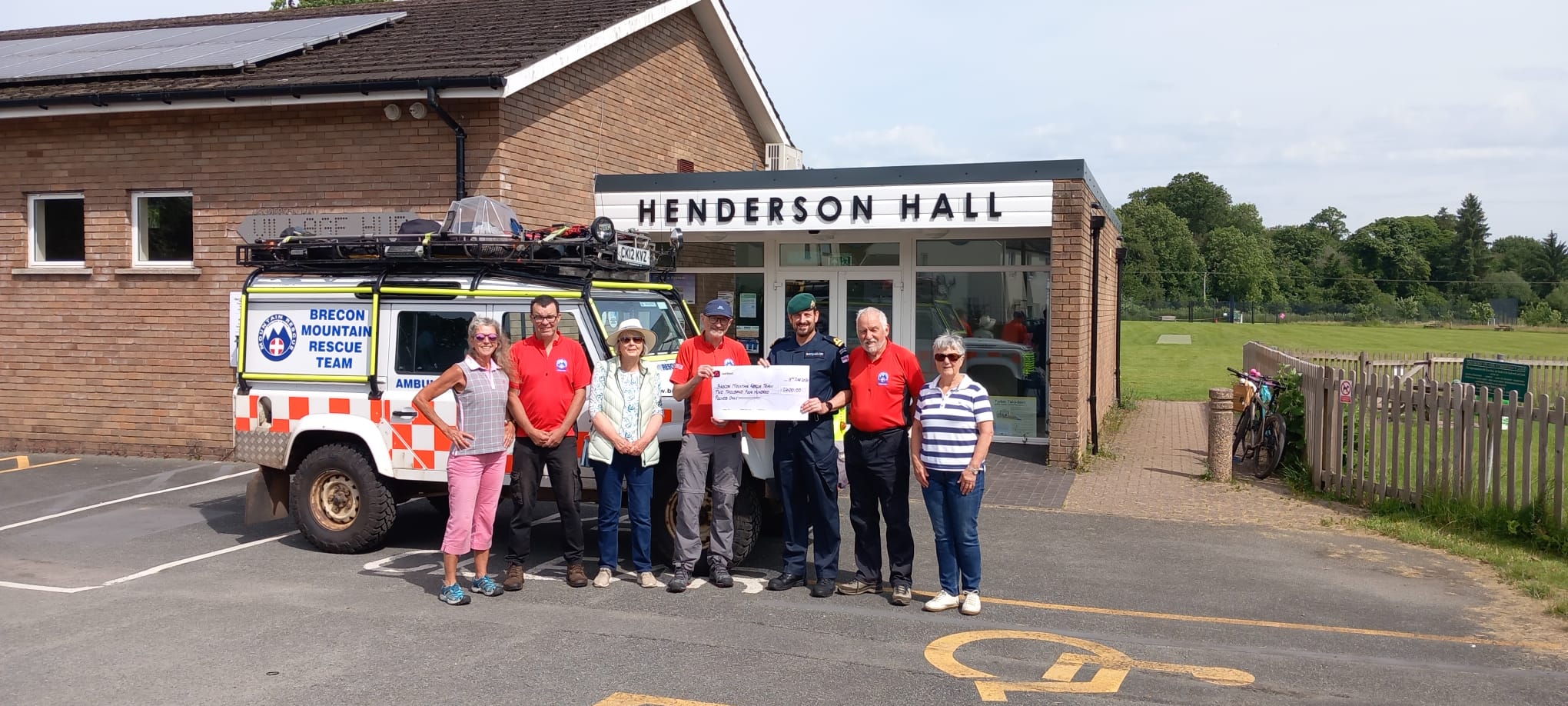 Rescue team receive £2,400 cheque from Royal Marine Band Concert ...